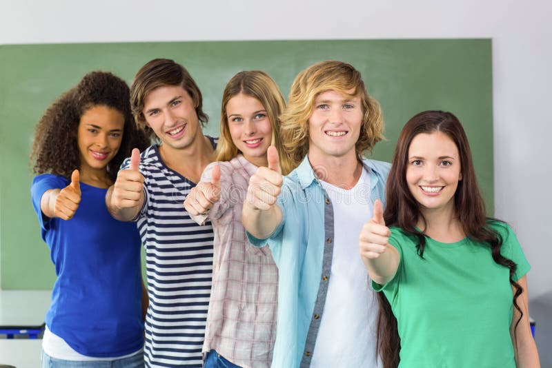 College Students Gesturing Thumbs Up Stock Photo - Image of cheerful ...