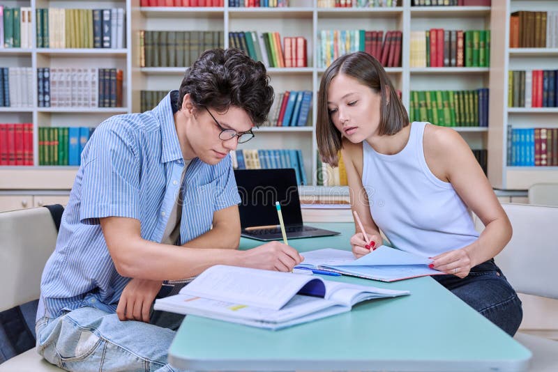 College Students Guy and Girl Study in Library Stock Image - Image of ...