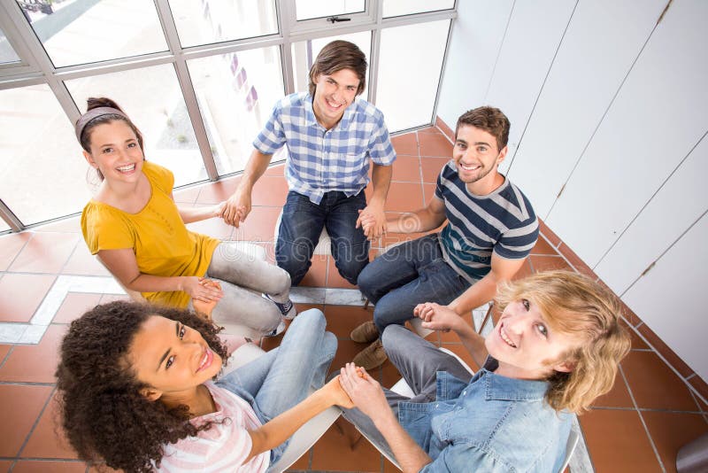 College Students Holding Hands Stock Photo - Image of female, academic ...