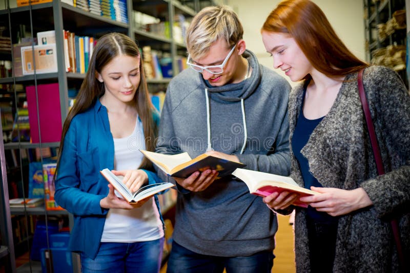 College Students in Library Stock Image - Image of bookshelf, casual ...