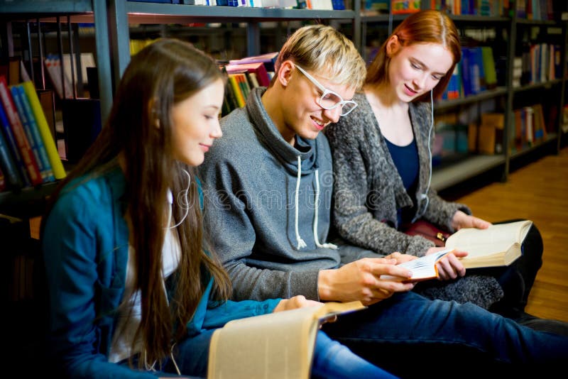 College Students in Library Stock Photo - Image of adult, indoors: 91340208