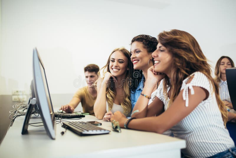 Students Sitting in a Classroom, Using Computers during Class Stock ...