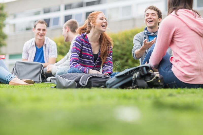 College Students Sitting in the Park Stock Photo - Image of young ...