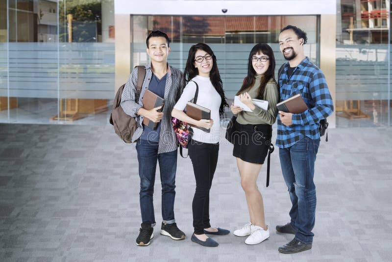 College Students Standing in the University Stock Image - Image of ...