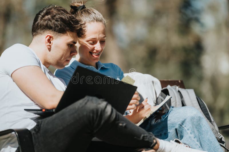 College Students Studying Together in a Sunny Park, Learning Outdoors ...