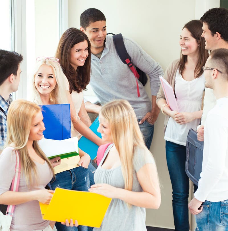 Group of Female High School Students Talking by Lockers Stock Image ...