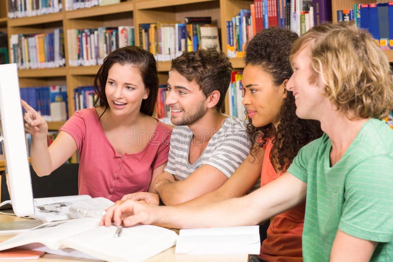 College Students Using Computer in Library Stock Image - Image of adult ...