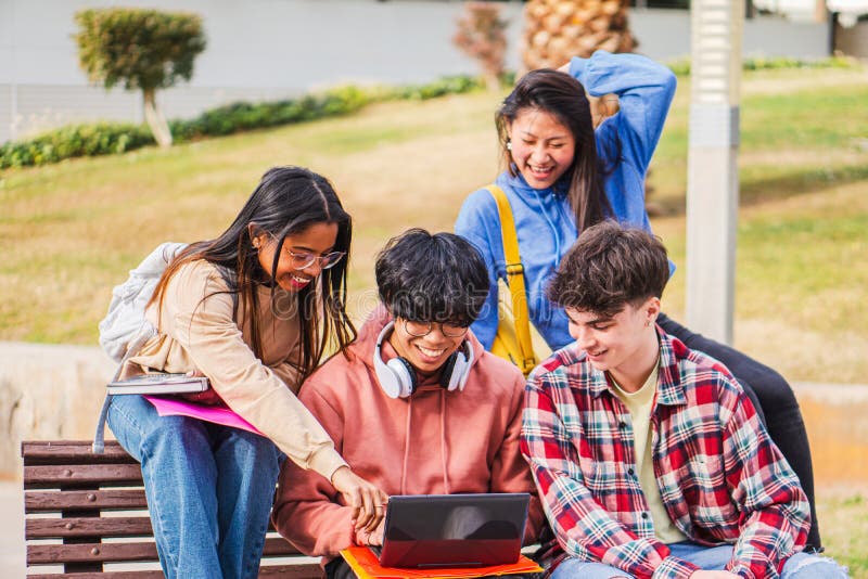 College Students Using Laptop in the Campus, Studying Together Stock ...