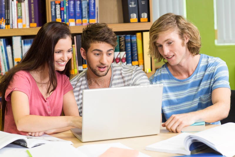 College Students Using Laptop in Library Stock Photo - Image of learn ...