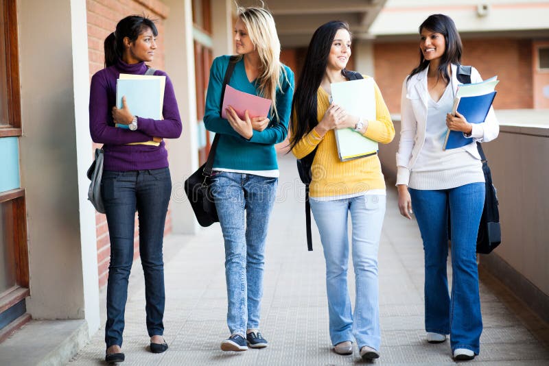 College students walking stock photo. Image of books - 25911006