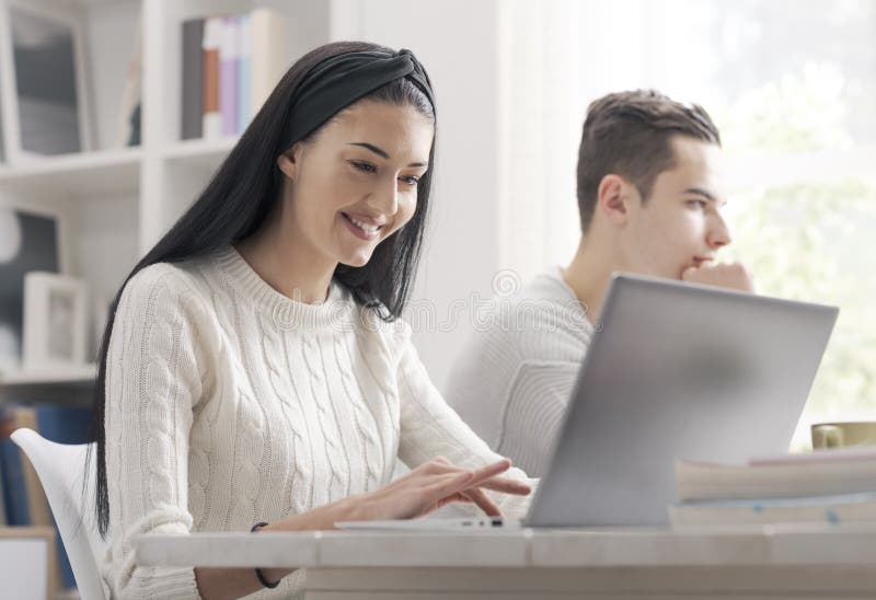 College Students Working on a Project Together Stock Image - Image of ...
