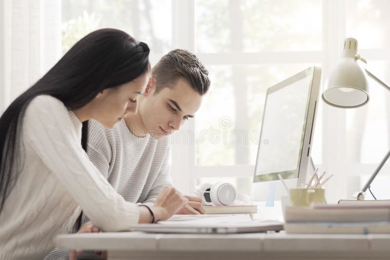 College Students Working on a Project Together Stock Image - Image of ...
