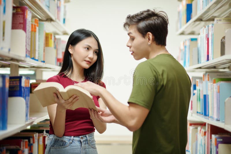 College Students Working on Research Stock Photo - Image of bookshelf ...