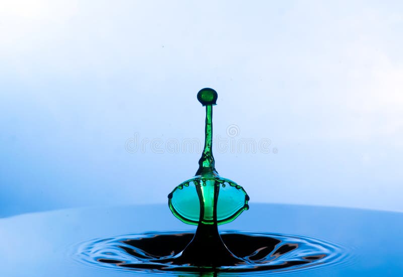 Collision of Two Drops on a Surface of Water Stock Photo - Image of ...