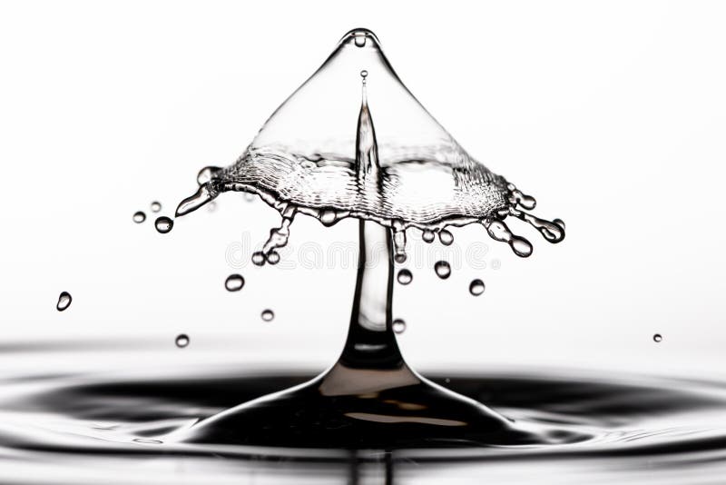 Collision of Two Water Droplets Hitting the Surface Stock Photo - Image ...