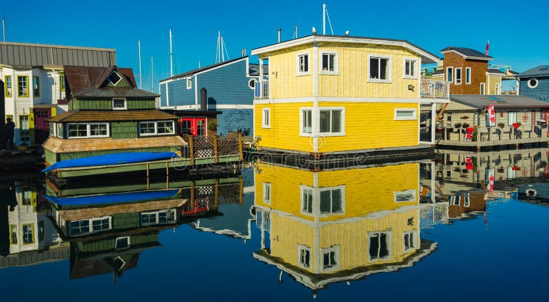 Colorful Village of Float Homes on Bright Sunny Day, Blue Sky. Stock ...