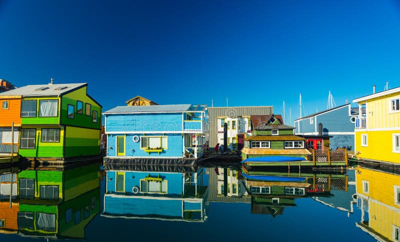 Colorful Village of Float Homes on Bright Sunny Day, Blue Sky. Stock ...