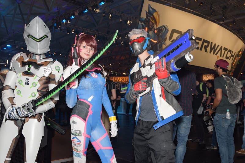 Three Cosplayer are Posing with Weapons at the Trade Fair Gamesc ...