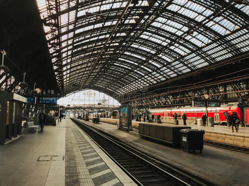 Cologne, Germany - March 19, 2022 - a Train Station with a Red Train on ...