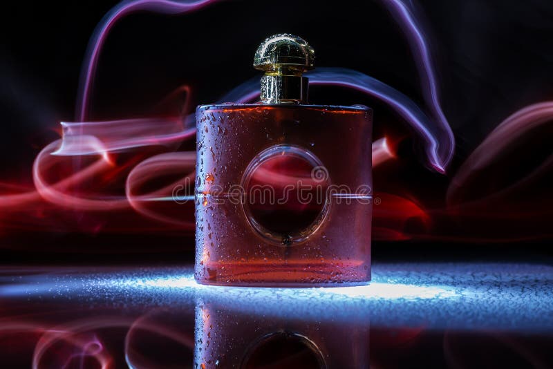 Bottle of Cologne Perfume on Red Light Background Stock Photo - Image ...