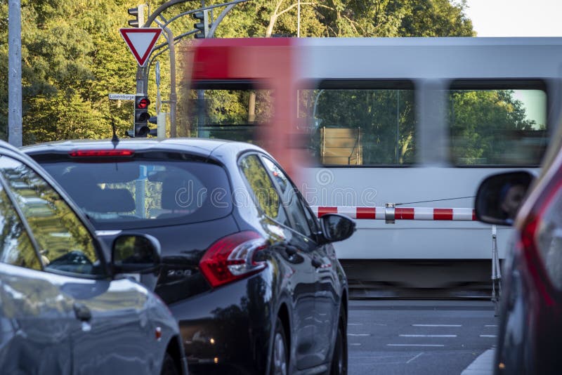 Cologne Tram at a Street Crossing, Traffic Light is on Red Editorial ...