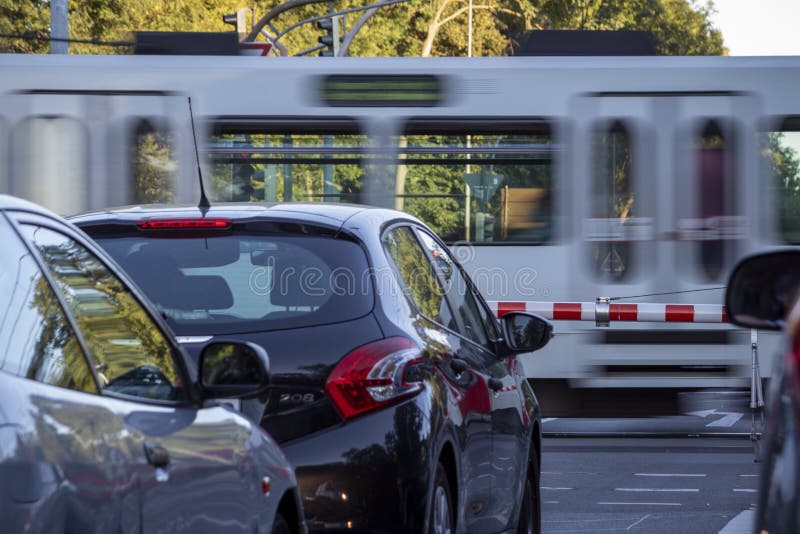Cologne Tram at a Street Crossing, Traffic Light is on Red Stock Image ...