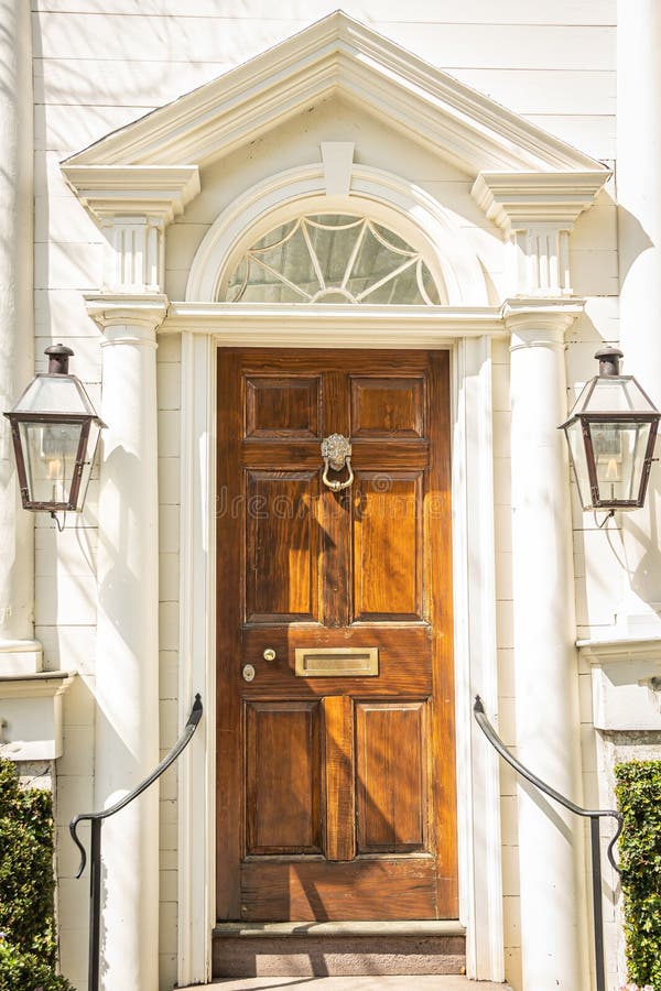 A Colonial Style Front Door with an Eccentric Door Frame Stock Photo ...