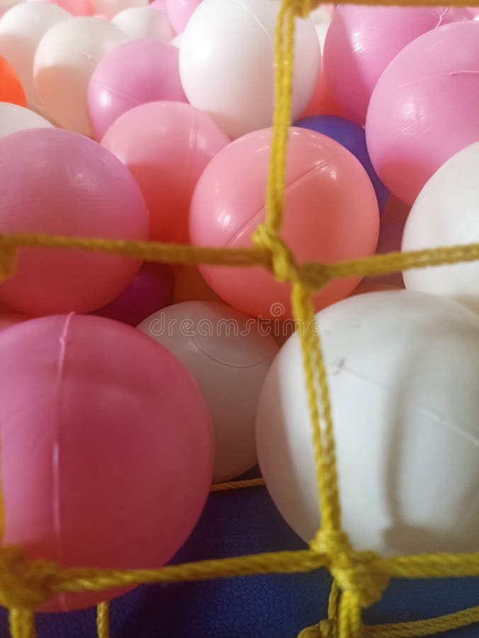 Color balls in the net stock image. Image of colors - 270448685