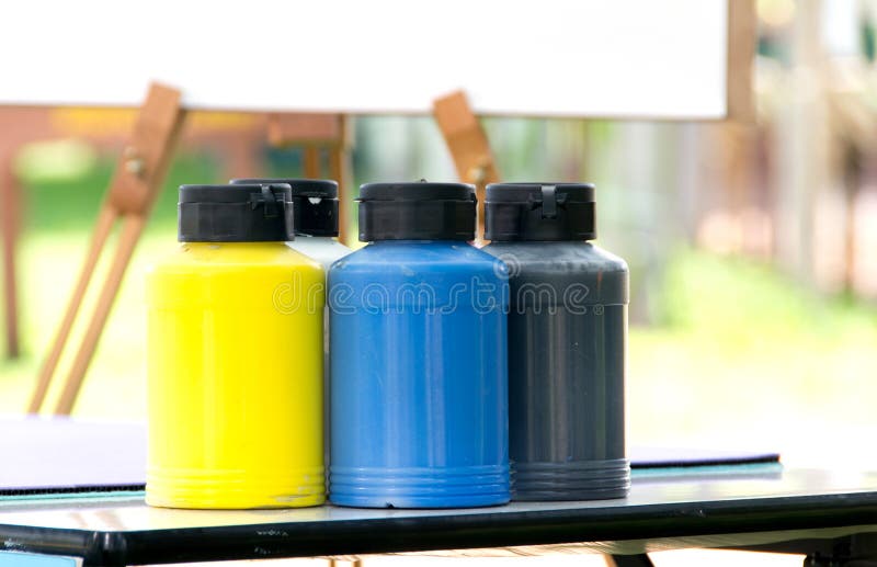Color bottles of a paint stock photo. Image of round - 31270138