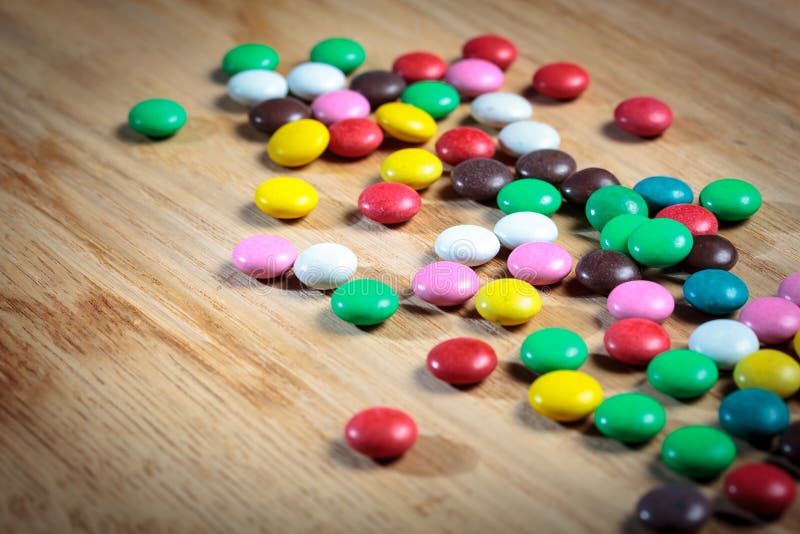 Color button candies stock image. Image of shaped, brown - 63586291