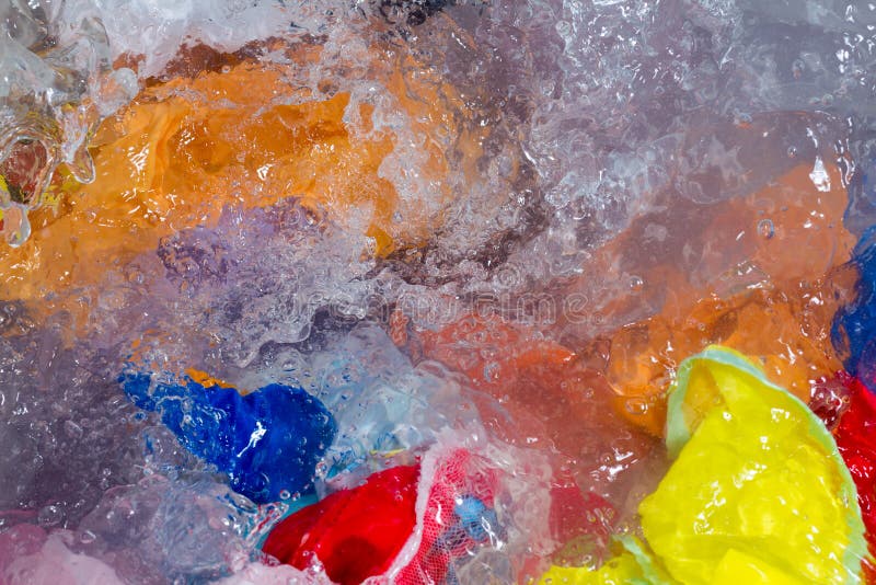 Color Clothes that Float Above the Water in the Washing Machine. Stock ...