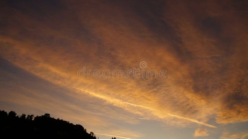 The Color of Clouds at Sunset Stock Photo - Image of scenic, orange ...