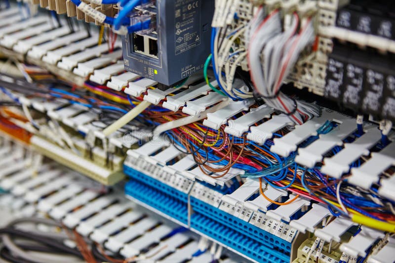 Color-Coded Electrical Wiring and Terminal Blocks in Industrial Setting ...