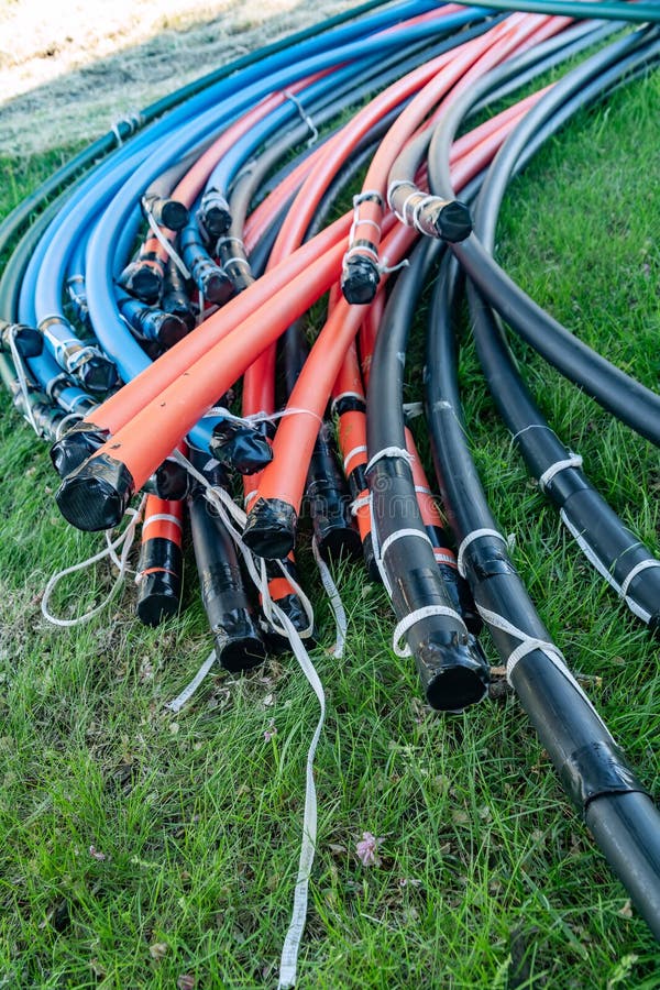 Color-Coded Piping System on Construction Lawn. Ready for Trenching ...