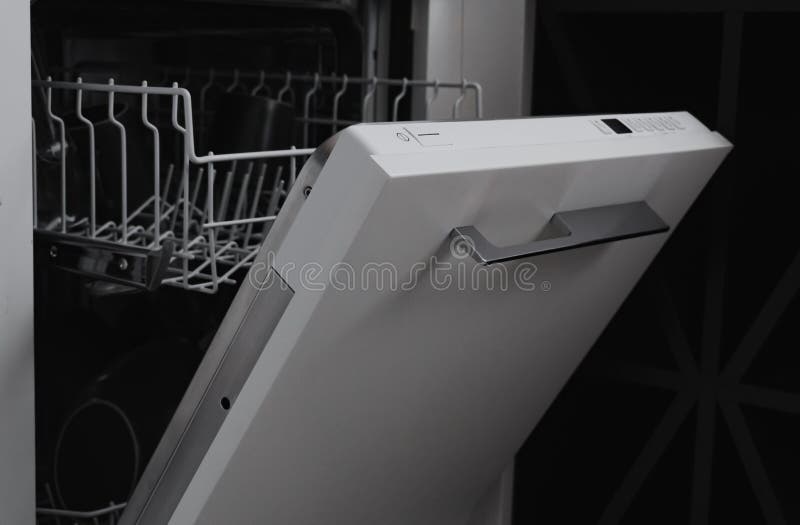 A View of an Open Dishwasher in a Modern Kitchen Interior, with Neatly ...