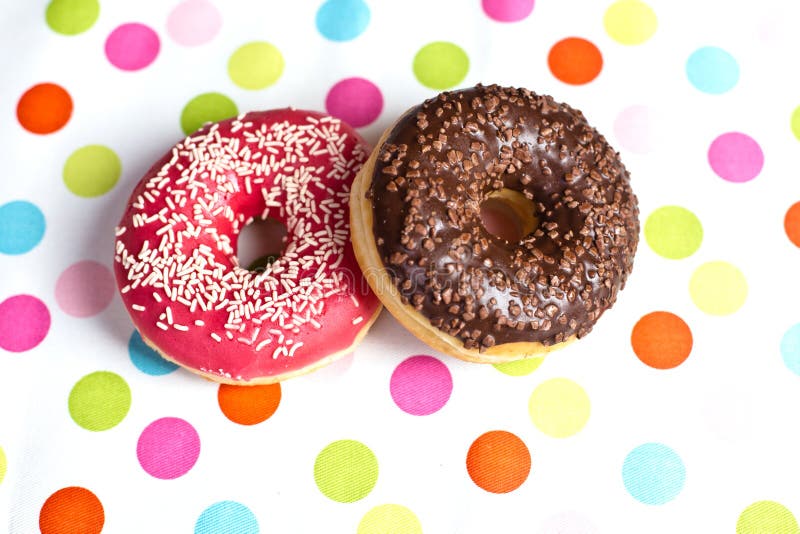 Color donut on a table stock photo. Image of placement - 36634544