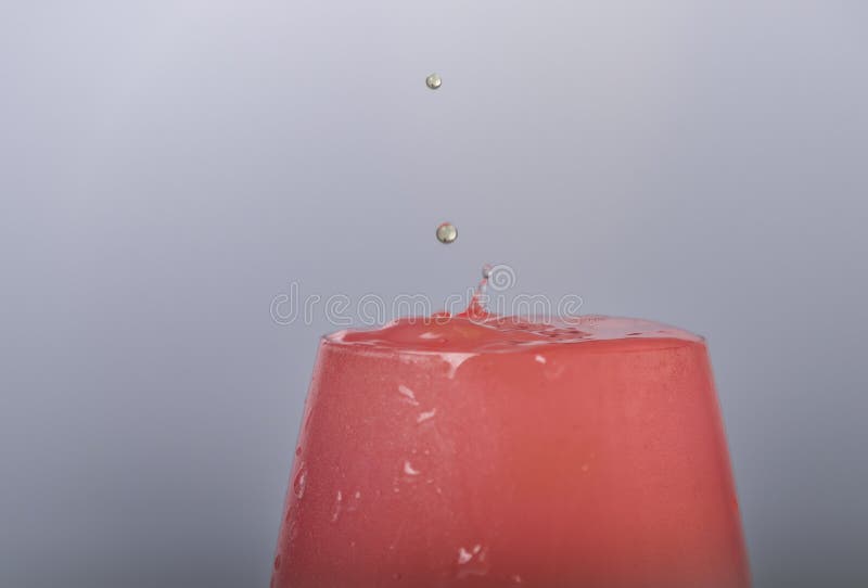 Color Drops Fall To Wine Glass with Color Liquid Stock Image - Image of ...