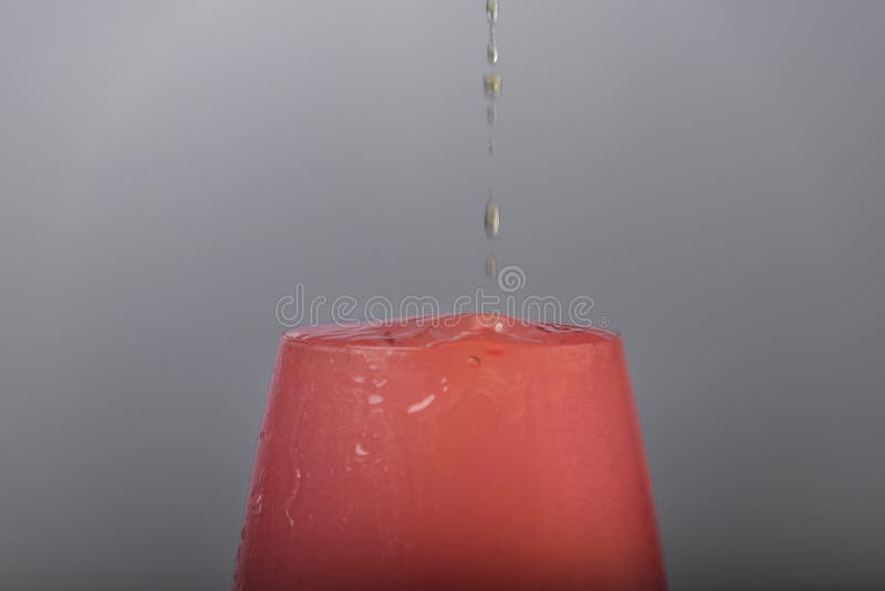 Color Drops Fall To Wine Glass with Color Liquid Stock Image - Image of ...