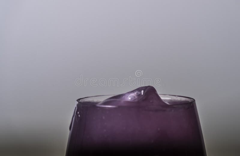 Color Drops Fall To Wine Glass with Color Liquid Stock Photo - Image of ...