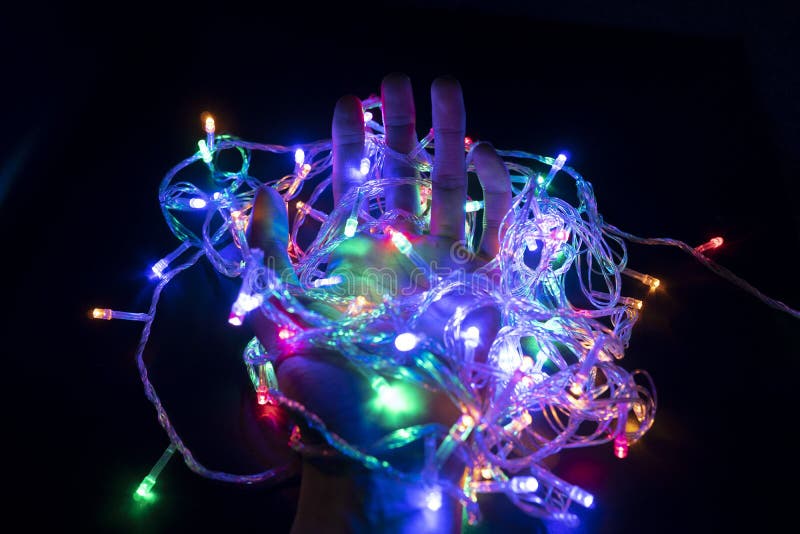 The Color of the Flashing Light in the Hand Holding the Light Bu Stock ...