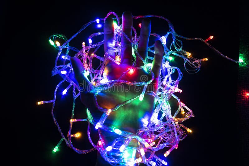 The Color of the Flashing Light in the Hand Holding the Light Bu Stock ...