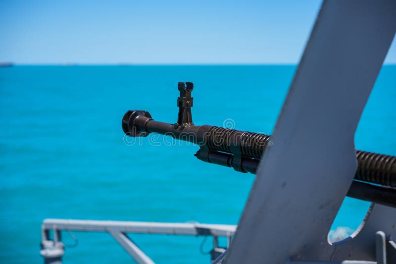 Automated Machine Gun on the Deck of a Military Ship Stock Image ...