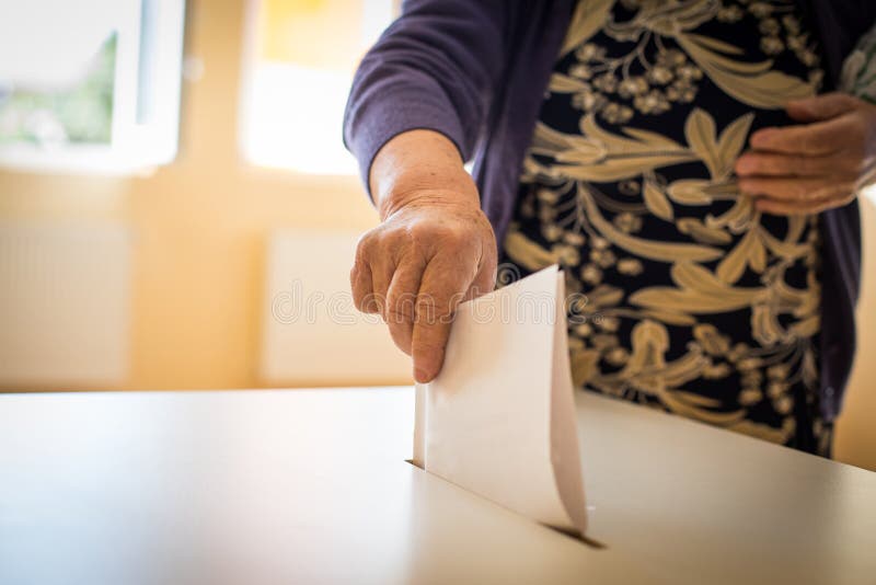 Person Voting, Casting a Ballot Stock Image - Image of campaign ... Person Voting, Casting a Ballot Stock Image - Image of campaign ...