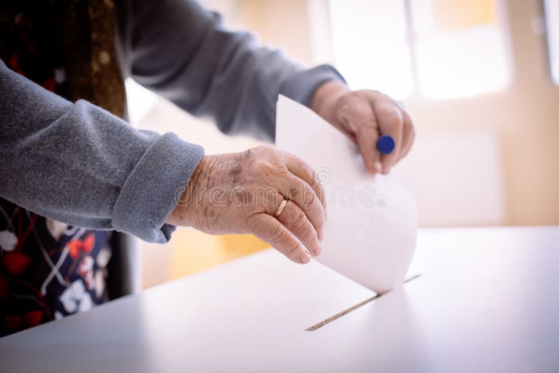 Person Voting, Casting a Ballot Stock Photo - Image of election ... Person Voting, Casting a Ballot Stock Photo - Image of election ...