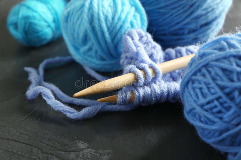 Color Knitting Yarn with Unfinished Clothes on Table Stock Image ...