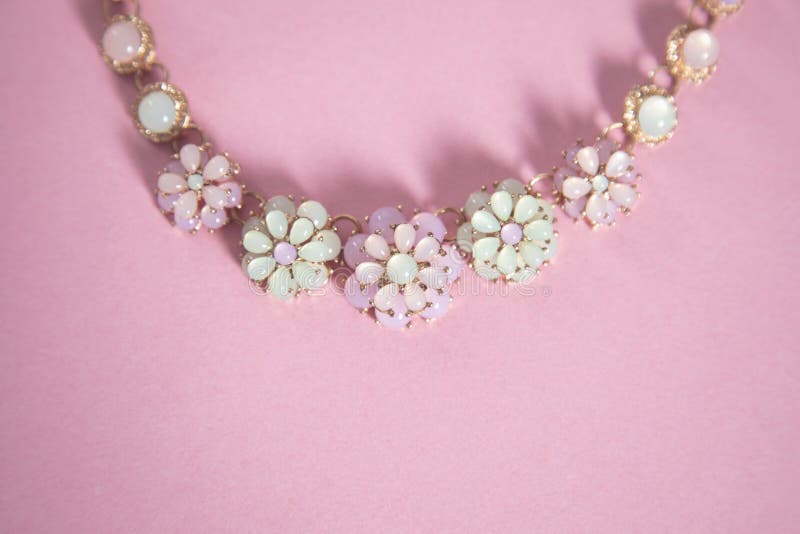 Color Necklace on the Pink Table Stock Photo - Image of fresh, necklace ...