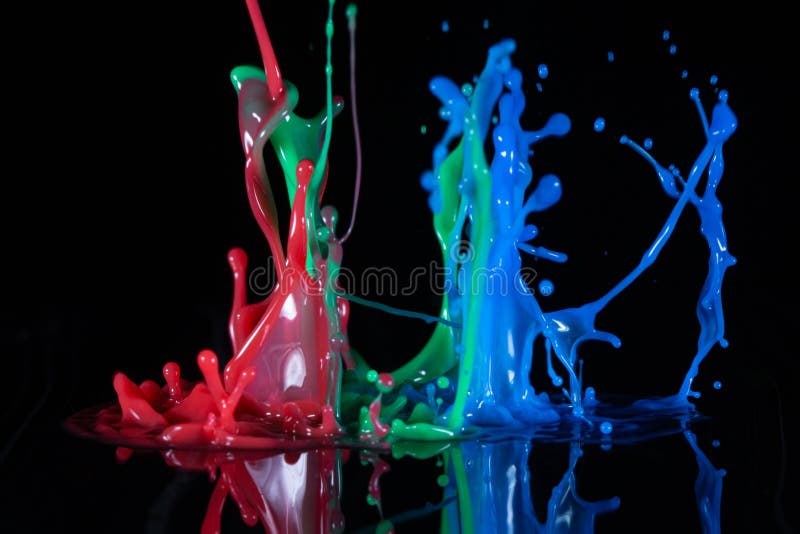 Color Ink Splash on a Black Background Stock Image - Image of colors ...