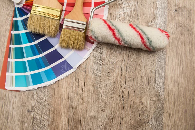 Color Palette Guide and Paint Brush Roller on Wood Board Editorial ...