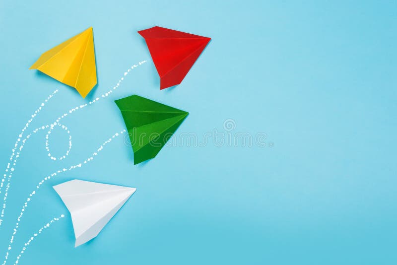 Color Paper Airplanes on Blue Background. Different Vision Creative and ...