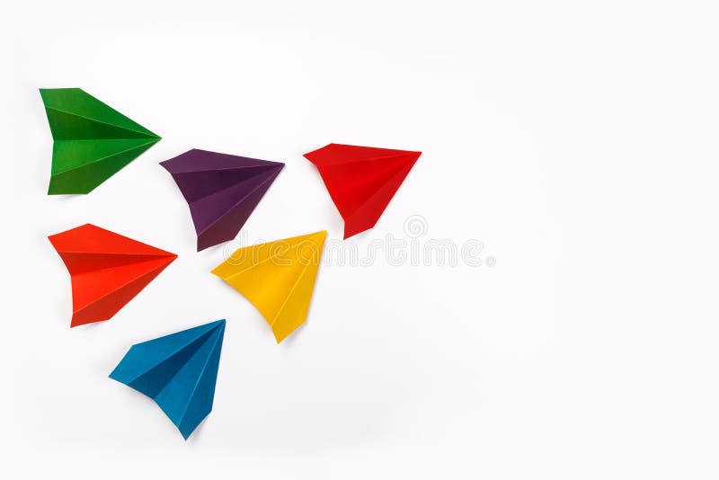 Color Paper Airplanes on Blue Background. Different Vision Creative and ...